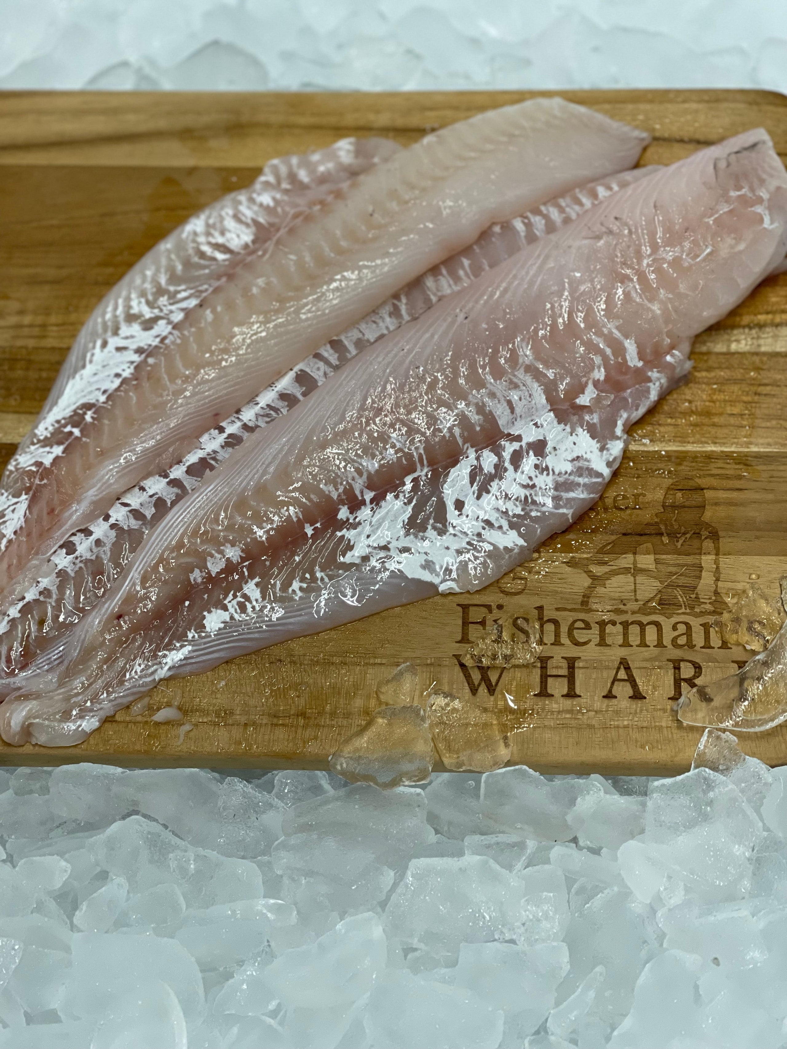 Haddock scrod 7+ ounces (2 lb bag) | Fisherman's Wharf Gloucester LLC